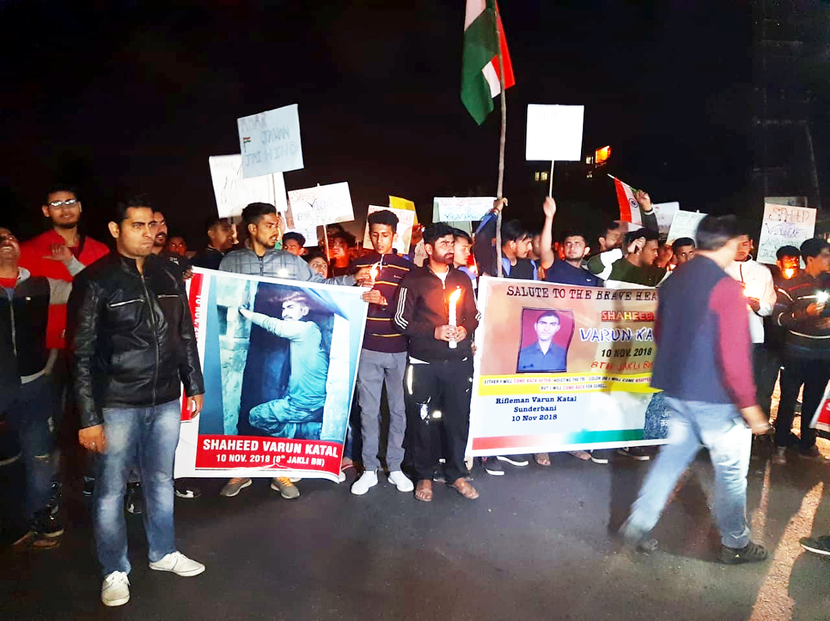 Candle march taken out to pay tributes to martyr - Daily Excelsior