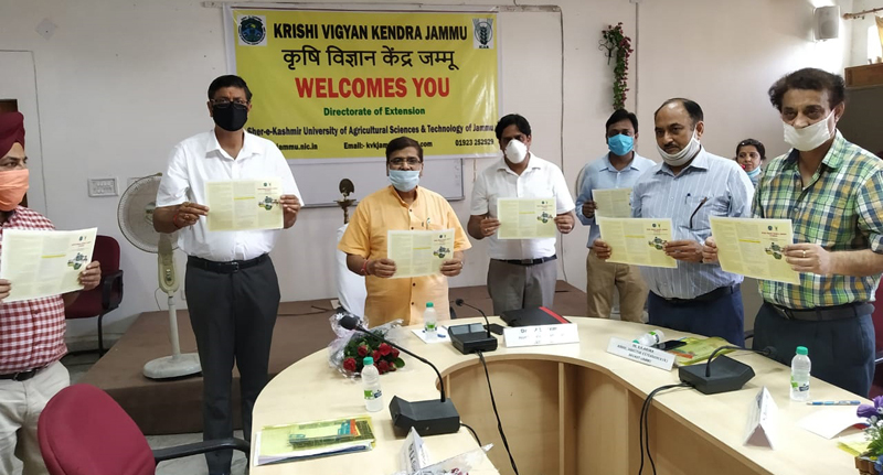 SKUAST-J Vice Chancellor, Prof J P Sharma releasing KVK pamphlet during ...