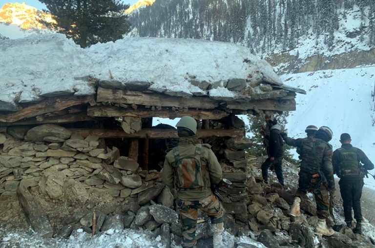 Security personnel at the site of encounter in Pir Panjal range along Mughal road in Poonch ...