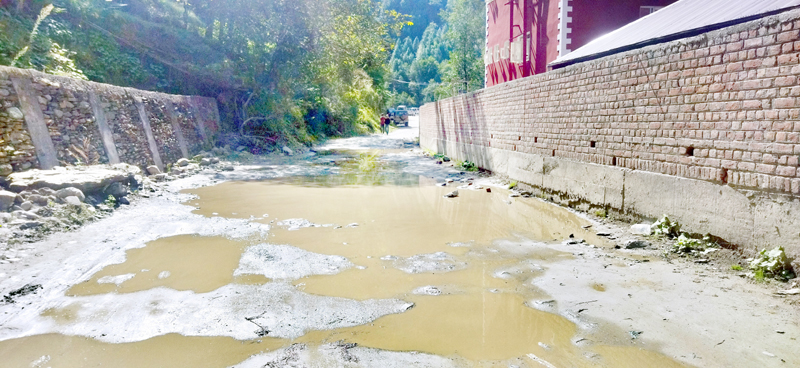 Road in dilapidated condition. -Excelsior/Rafi Choudhary - Daily Excelsior
