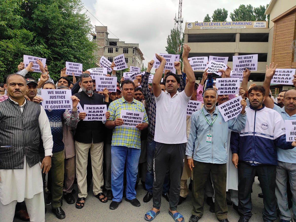 Employees of the Centaur Hotel staging protest at Srinagar. —Excelsior ...