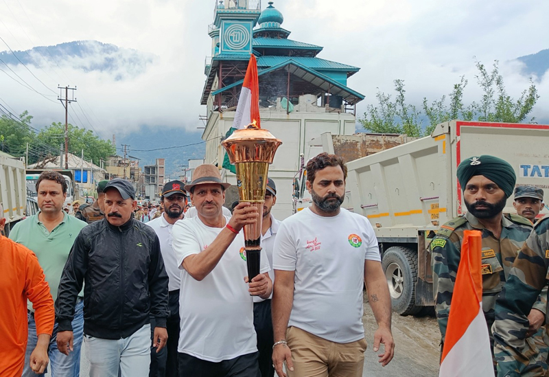Kargil Victory flame run being organised in Doda town on Monday ...