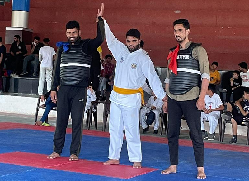 A winner being declared by the official of the Championship at ...